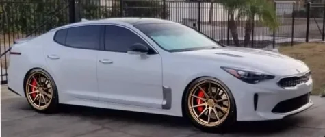 Gold Wheels White Car